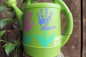 Handprint Flowers on a Watering Can Gift Idea - Angie Holden The ...